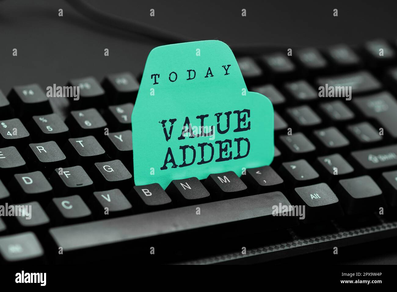 Sign displaying Value Added, Word Written on the extra value created ...