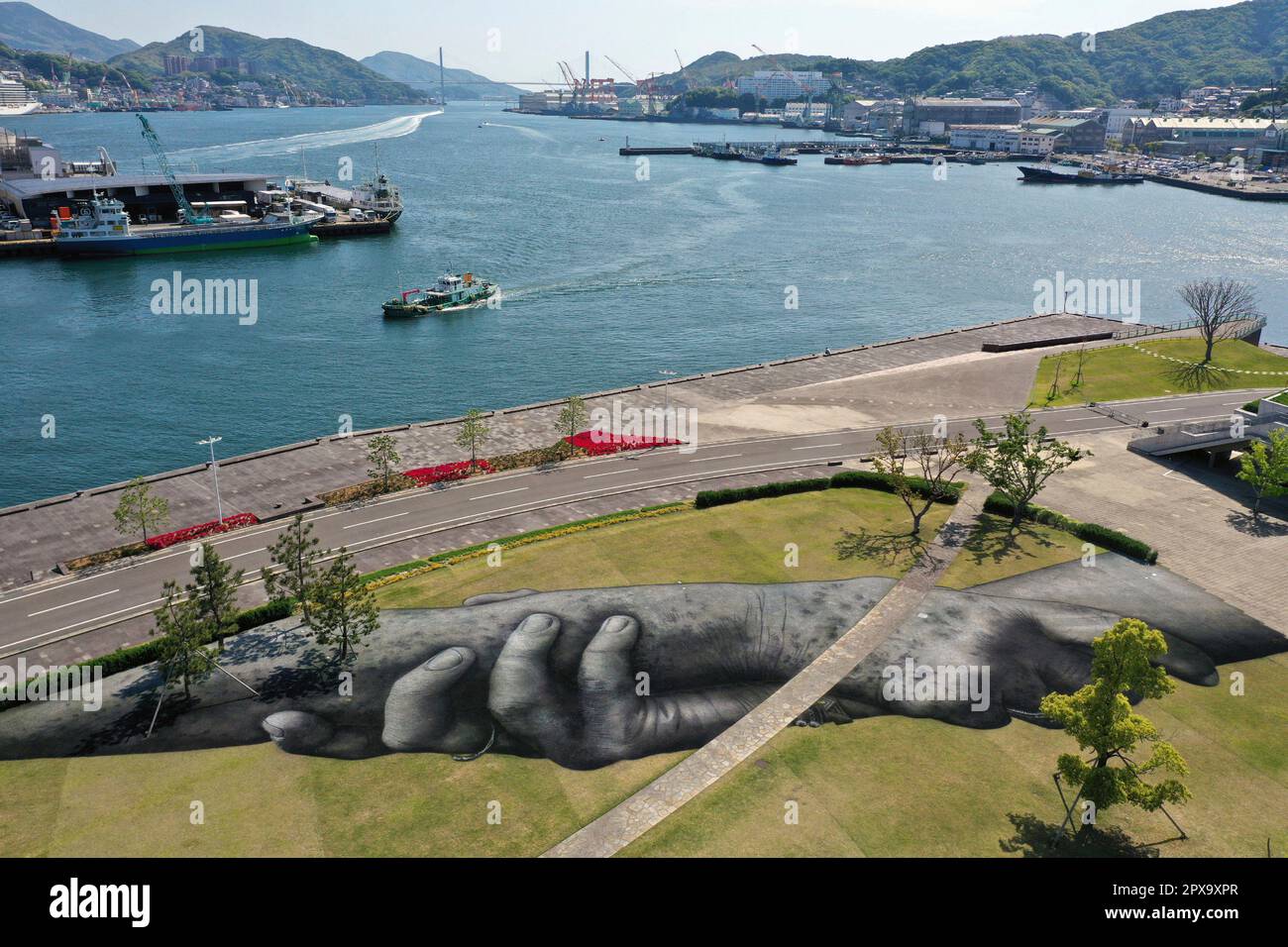 A giant geoglyph under the theme "Inheritance to the next generation ...