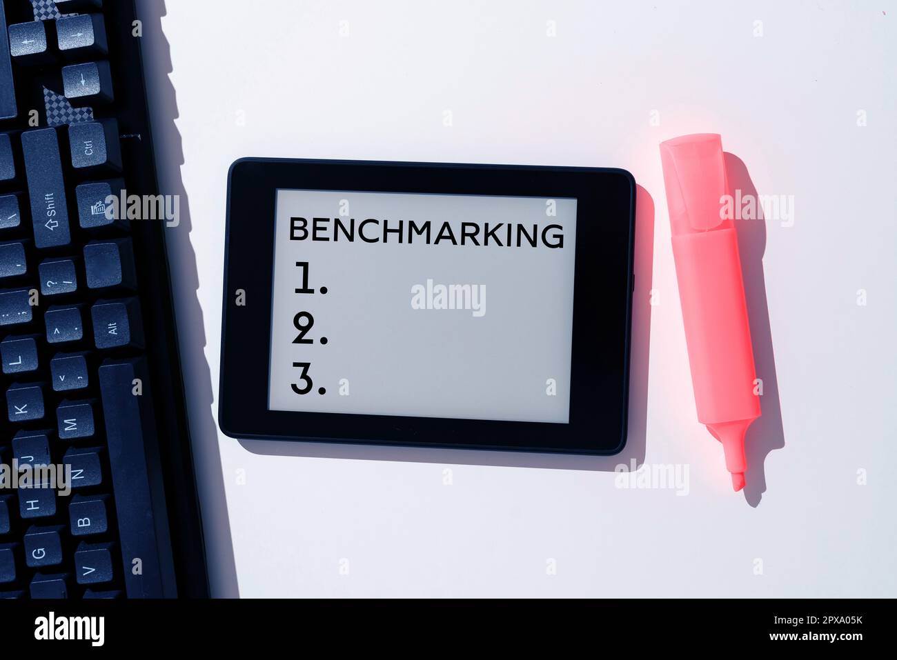Hand writing sign Benchmarking, Word Written on Evaluate something by ...