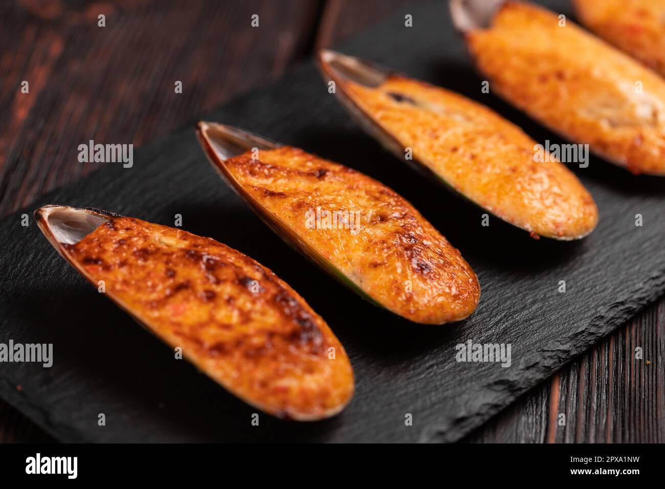 Fresh mussel baked with cheese top view - french or japanese cuisine ...