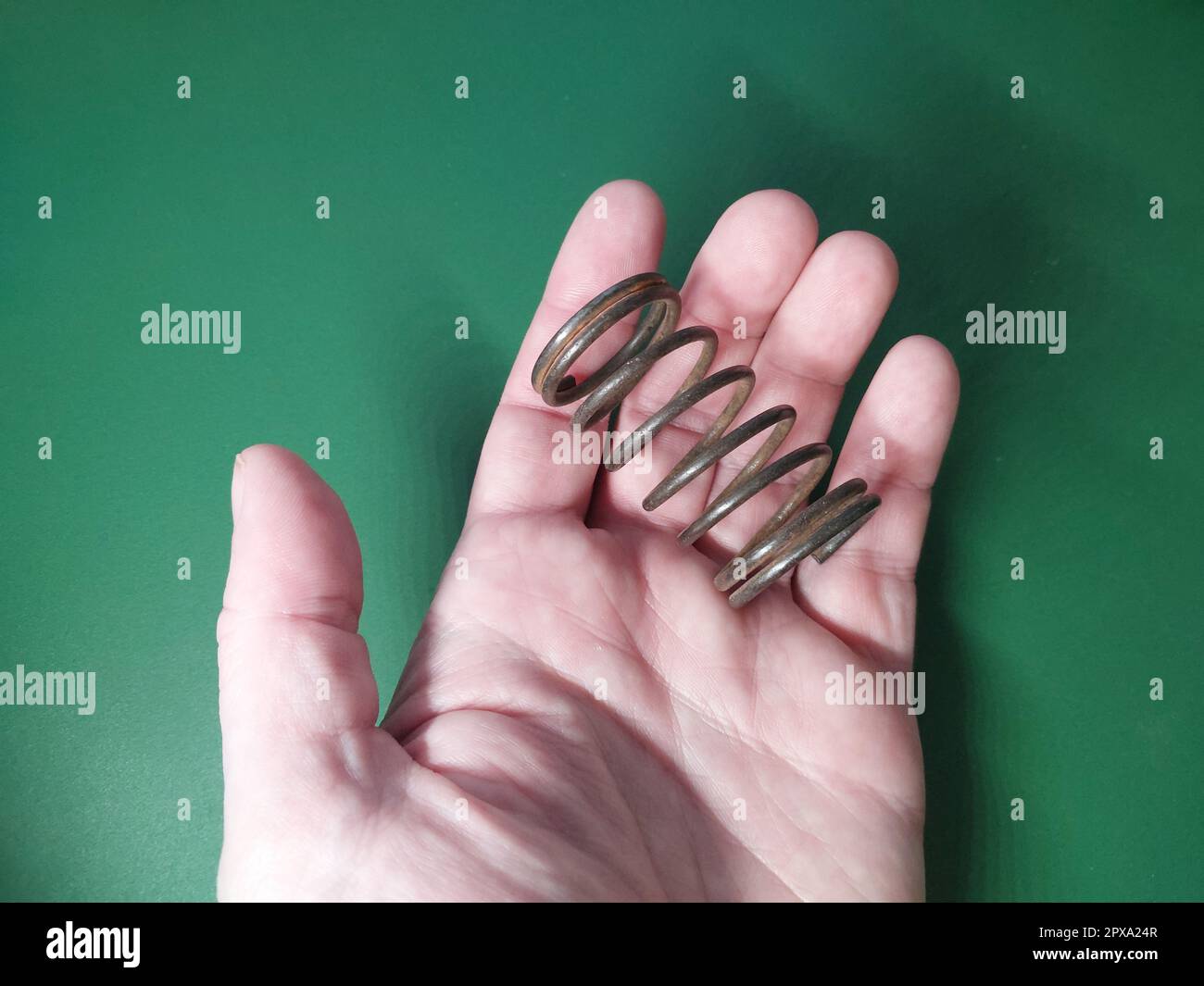 Metal spring for the technical products Stock Photo - Alamy