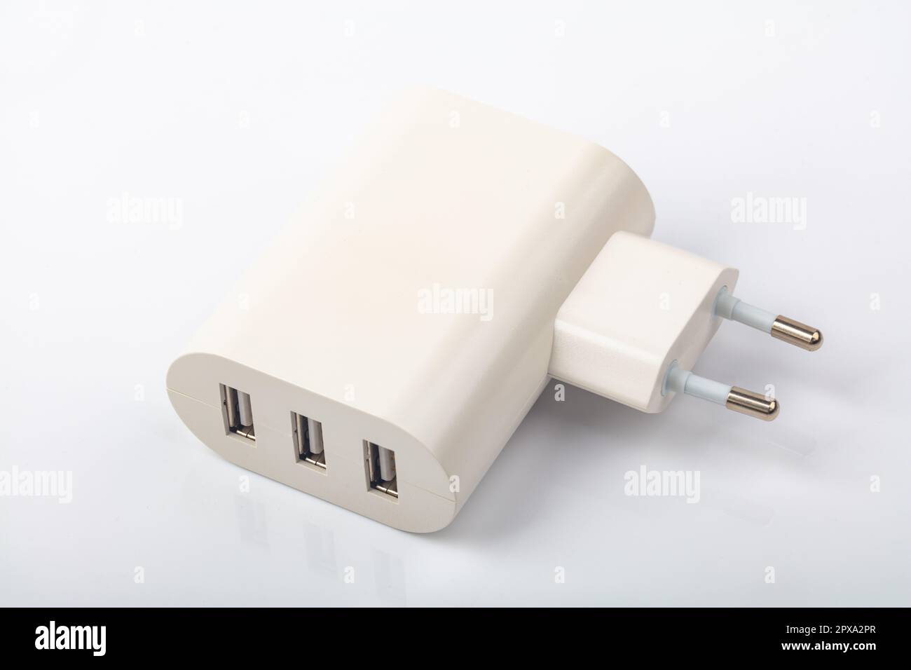 White USB Power Socket with three usb charging connectors over bright ...