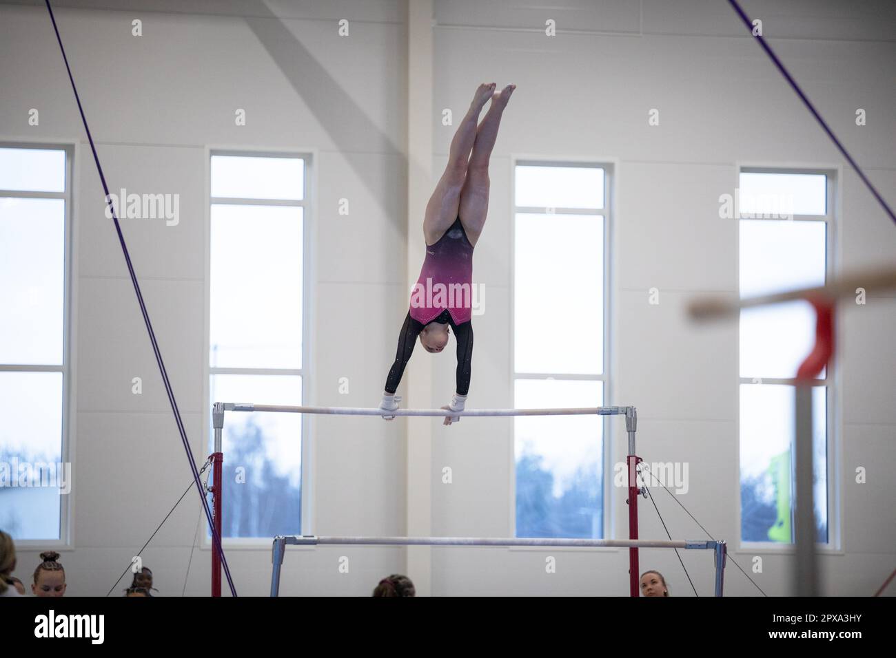 Gymnast uneven bars hi-res stock photography and images - Alamy