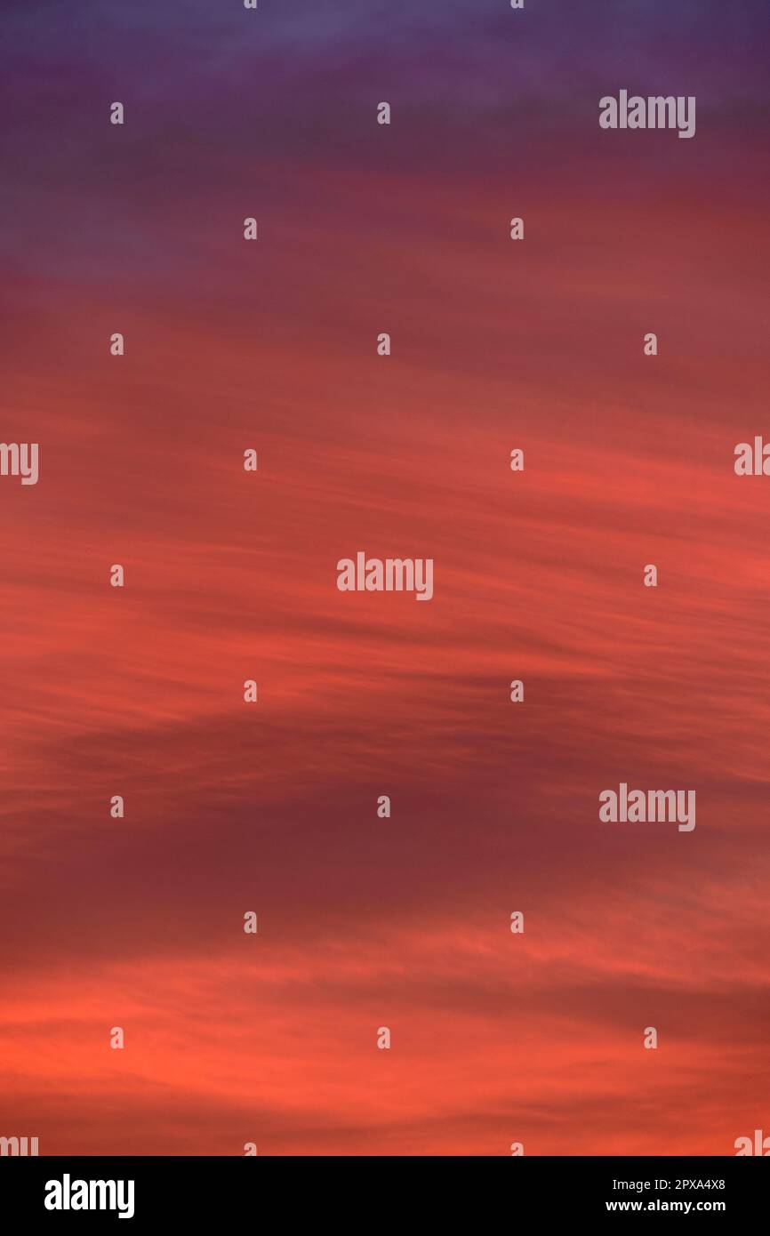 Sunset. Heaven, orange sky Sun rays Wallpaper Clouds Stock Photo - Alamy