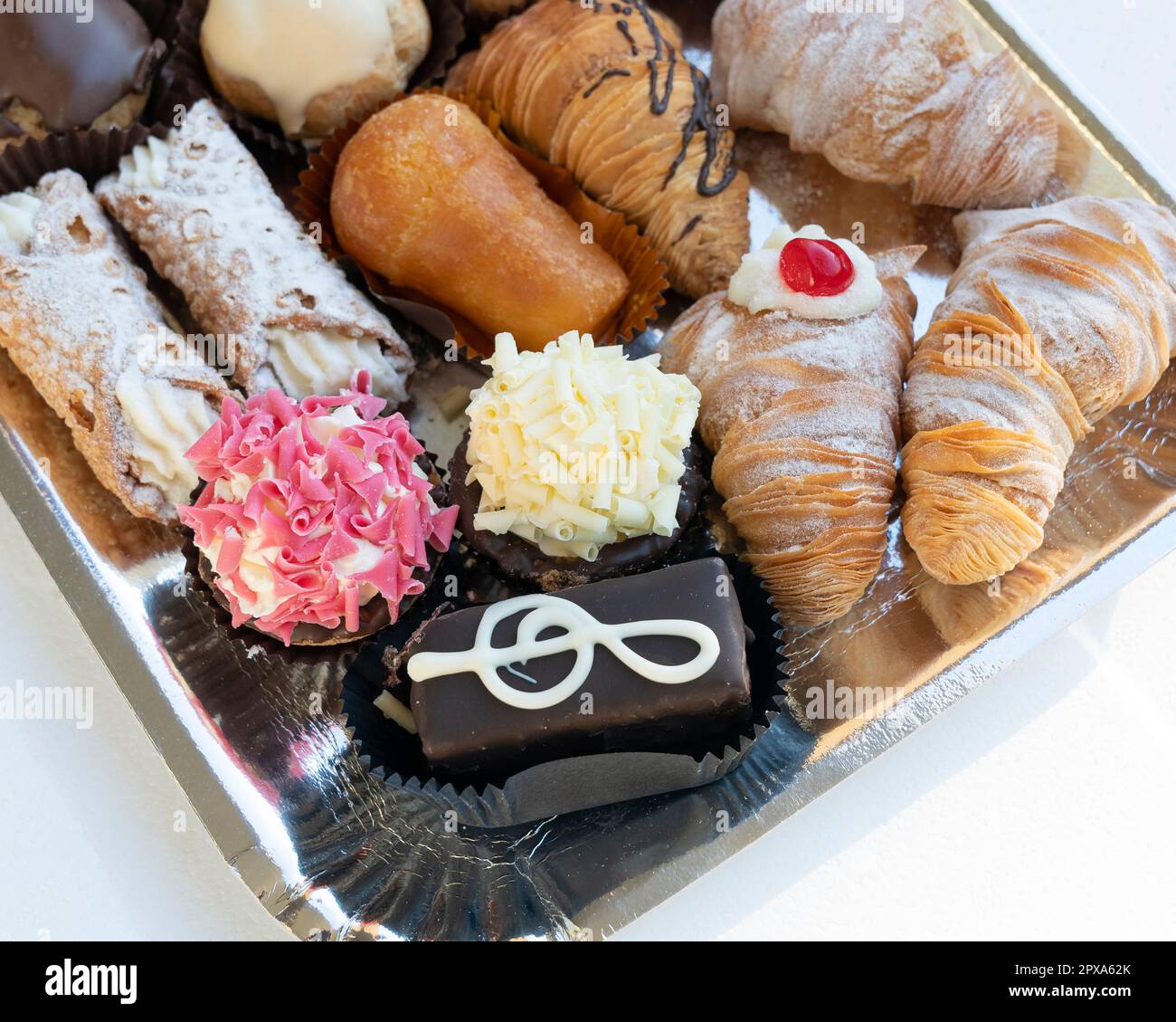 Top view of assortment of delicious and colorful pastries, made by ...