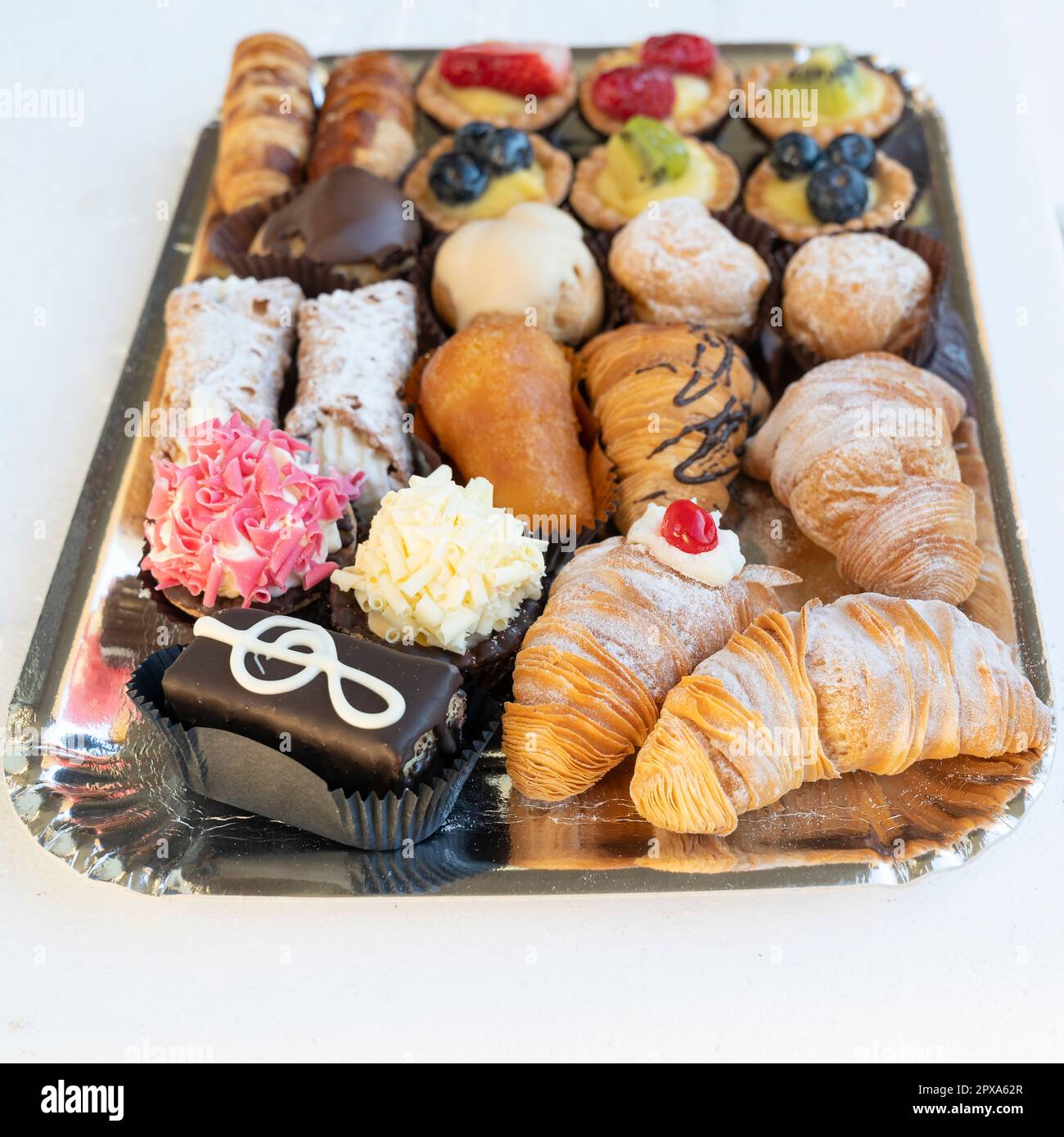 Top view of assortment of delicious and colorful pastries, made by ...