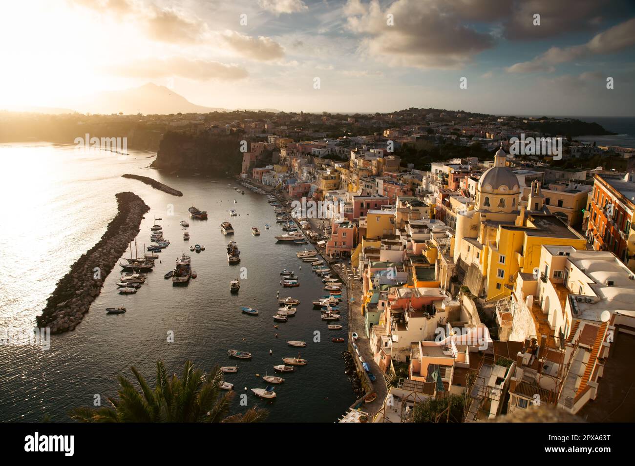 View of the Port of Corricella with lots of colorful houses in the ...