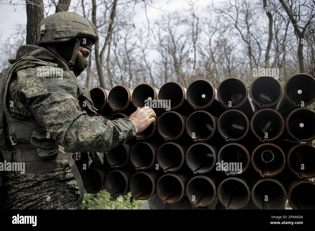 April 28.2023 Russia. Donetsk region. A soldier from the calculation of the multiple rocket ...