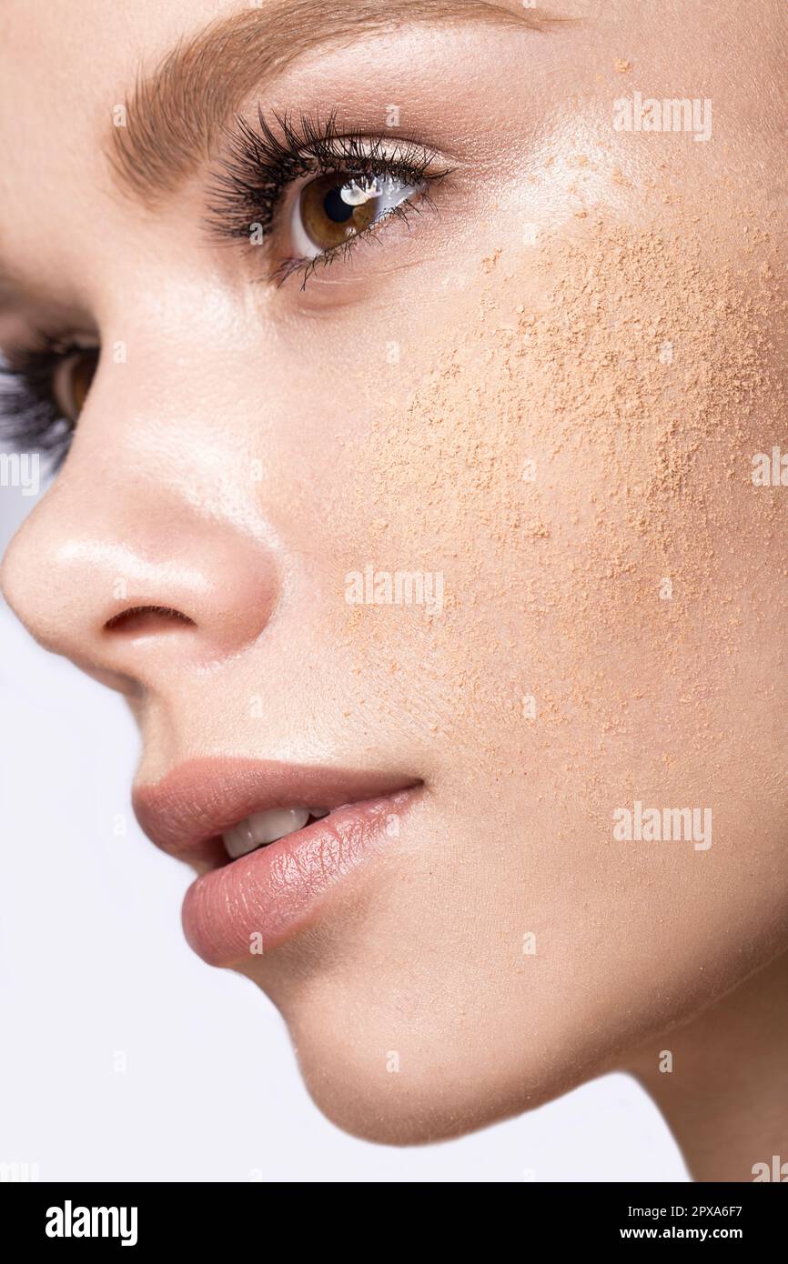 Beautiful young girl with tone powder on the skin. Beauty face. Picture ...
