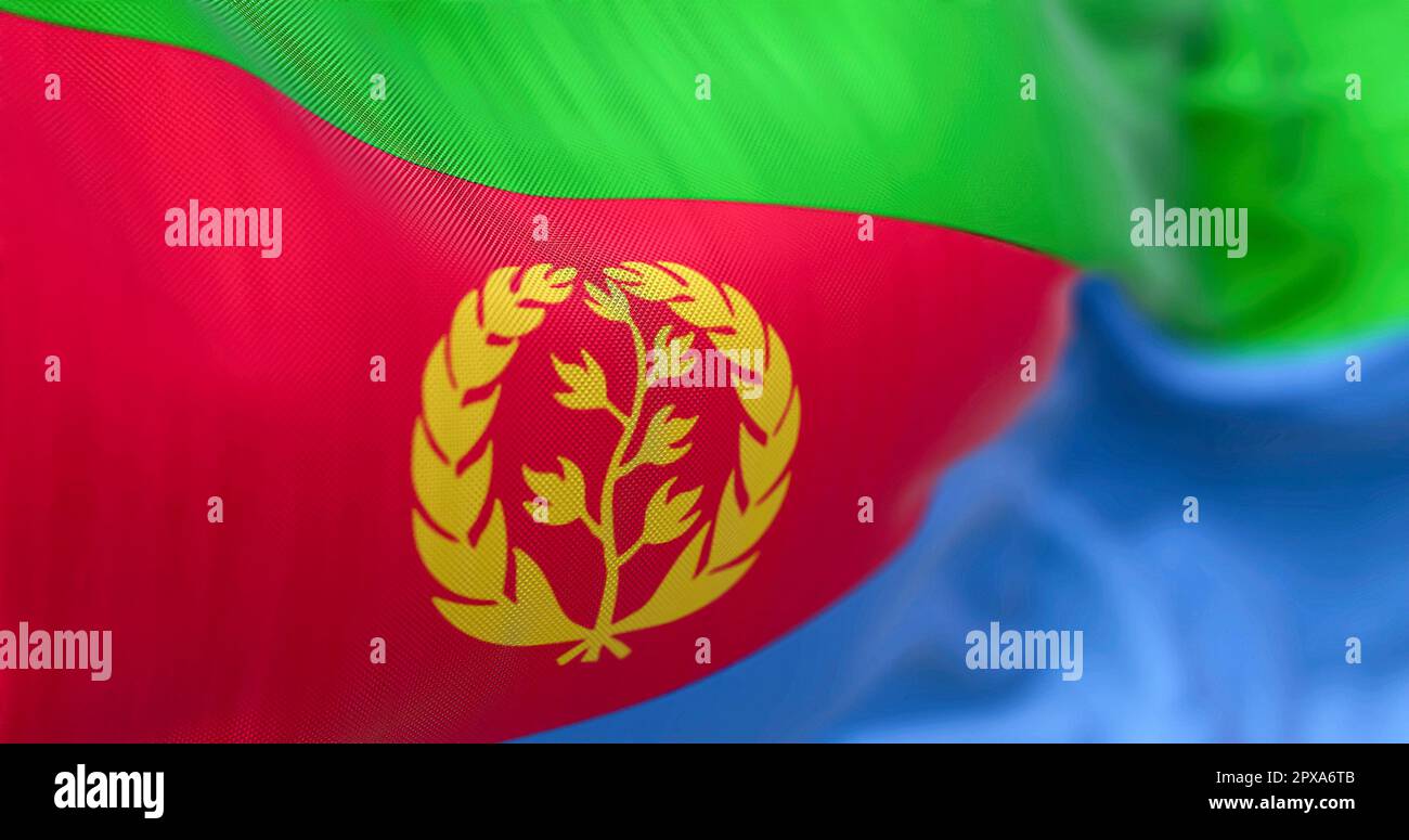 Close Up View Of The Eritrea National Flag Waving Eritrea Flag Is Red Triangle On Hoist Green