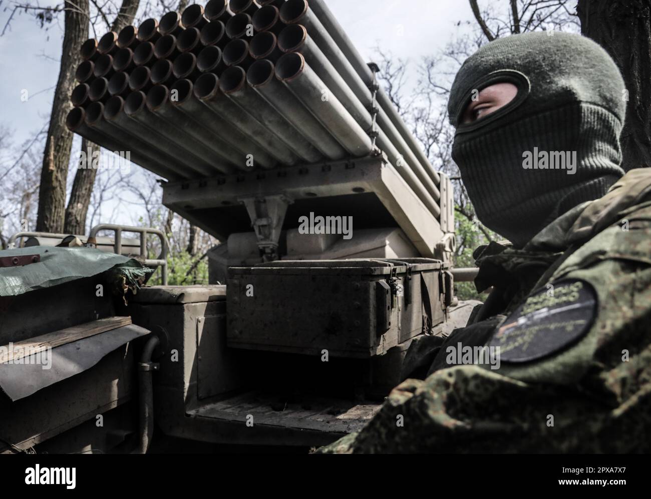 April 28.2023 Russia. Donetsk region. A soldier from the calculation of the multiple rocket ...