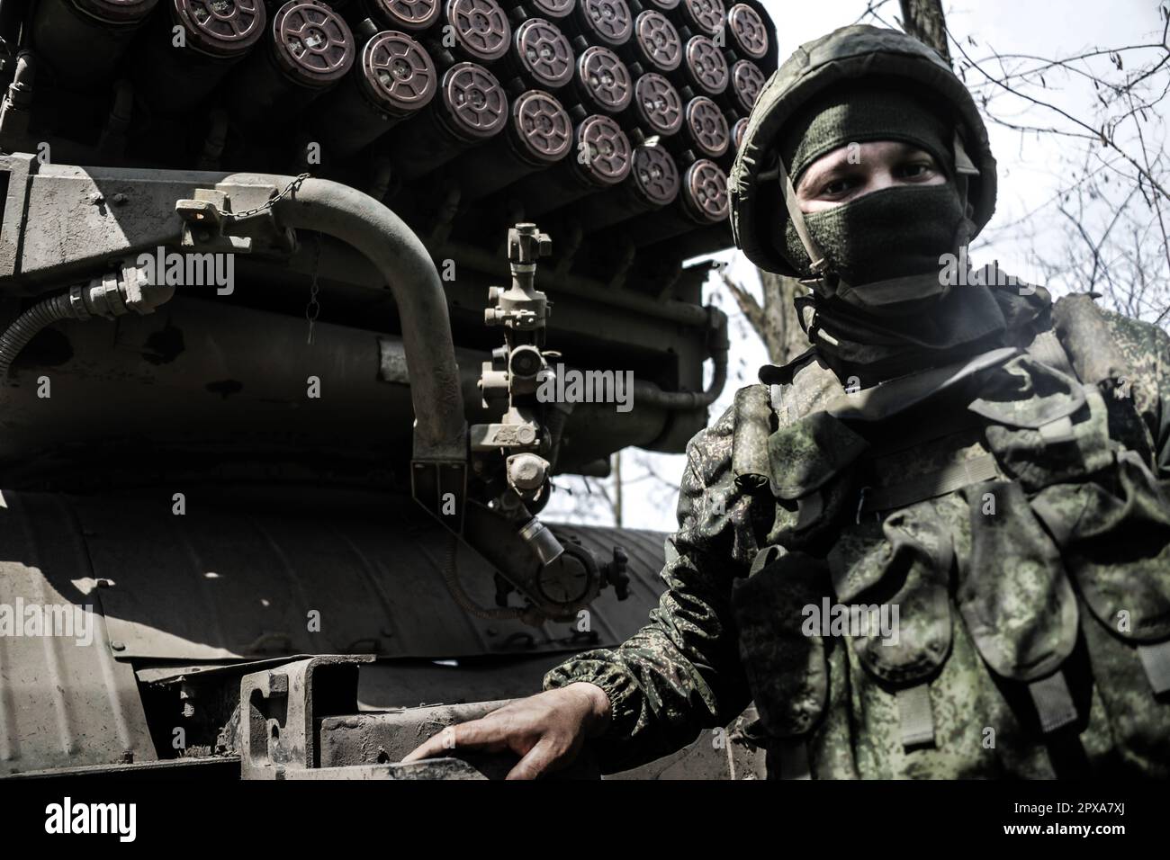 April 28.2023 Russia. Donetsk region. A soldier from the calculation of the multiple rocket ...