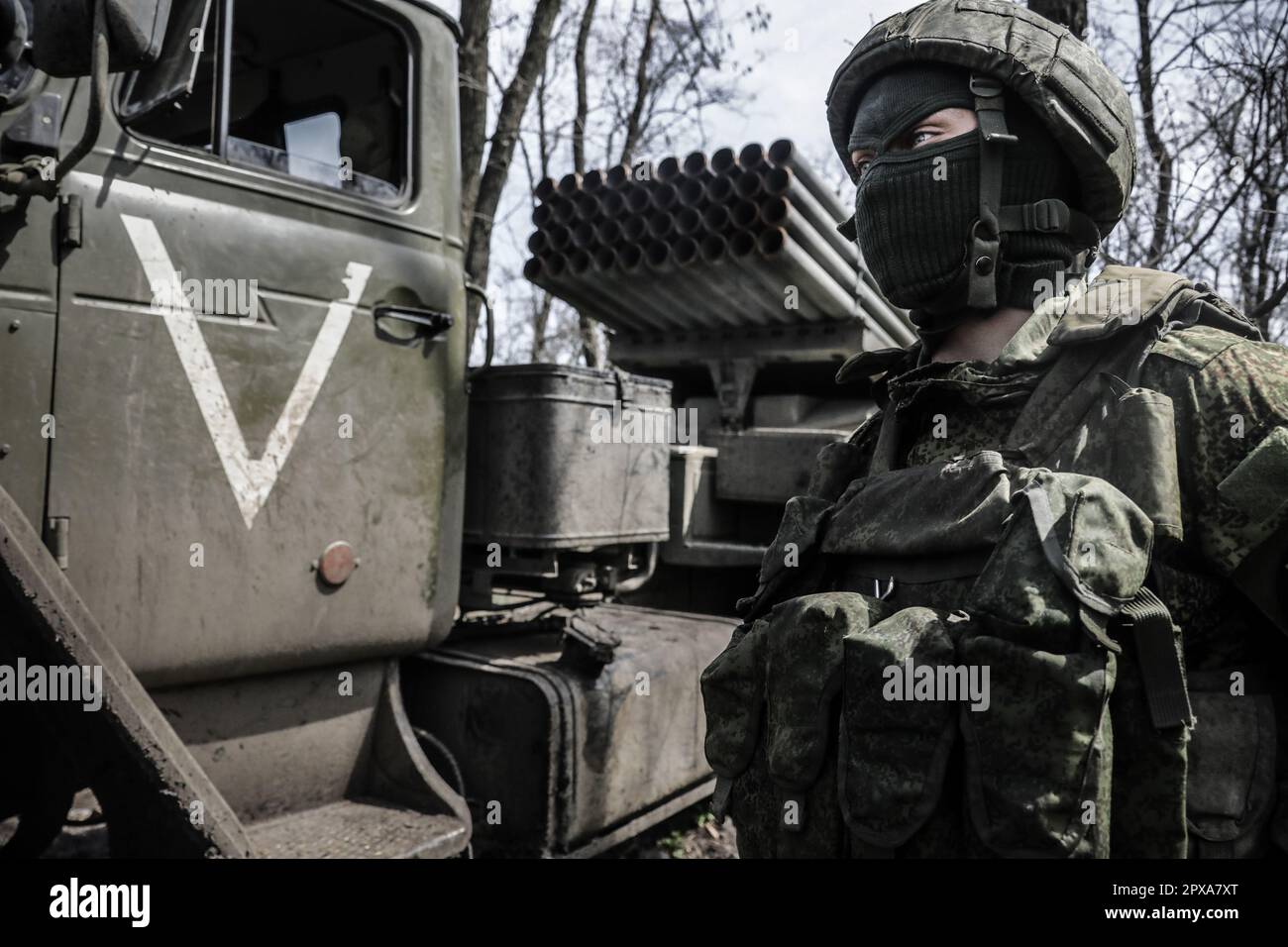 April 28.2023 Russia. Donetsk region. A soldier from the calculation of the multiple rocket ...