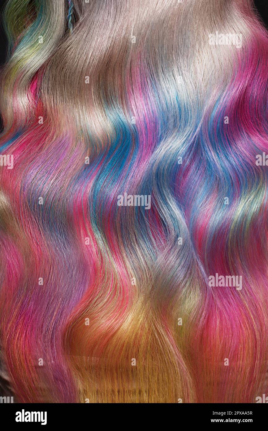 Beautiful girl with multi-colored hair and creative hairstyle. Beauty ...