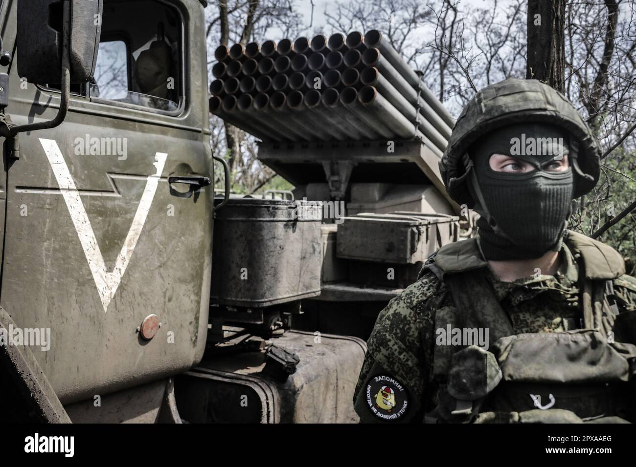 April 28.2023 Russia. Donetsk region. A soldier from the calculation of the multiple rocket ...