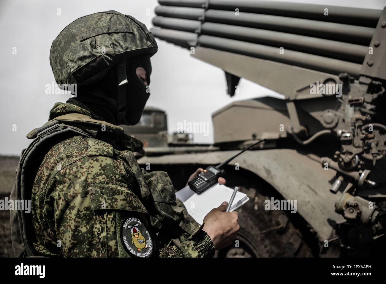 April 28.2023 Russia. Donetsk region. A soldier from the calculation of the multiple rocket ...