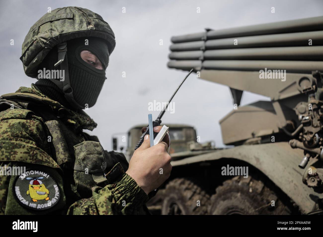 April 28.2023 Russia. Donetsk region. A soldier from the calculation of the multiple rocket ...
