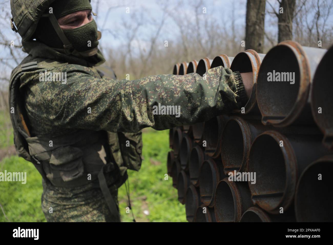 April 28.2023 Russia. Donetsk region. A soldier from the calculation of the multiple rocket ...