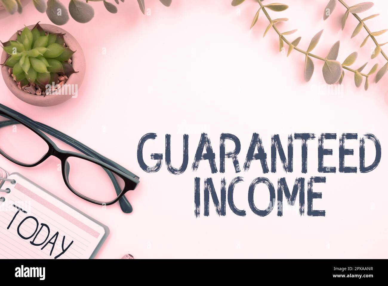 Hand writing sign Guaranteed Income, Word Written on earnings from ...