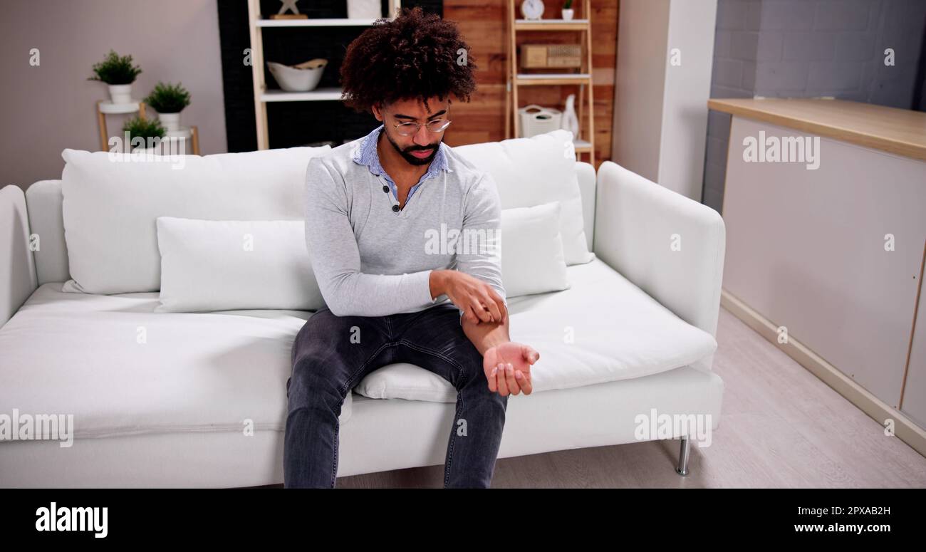 Itching skin, african american hi-res stock photography and images - Alamy