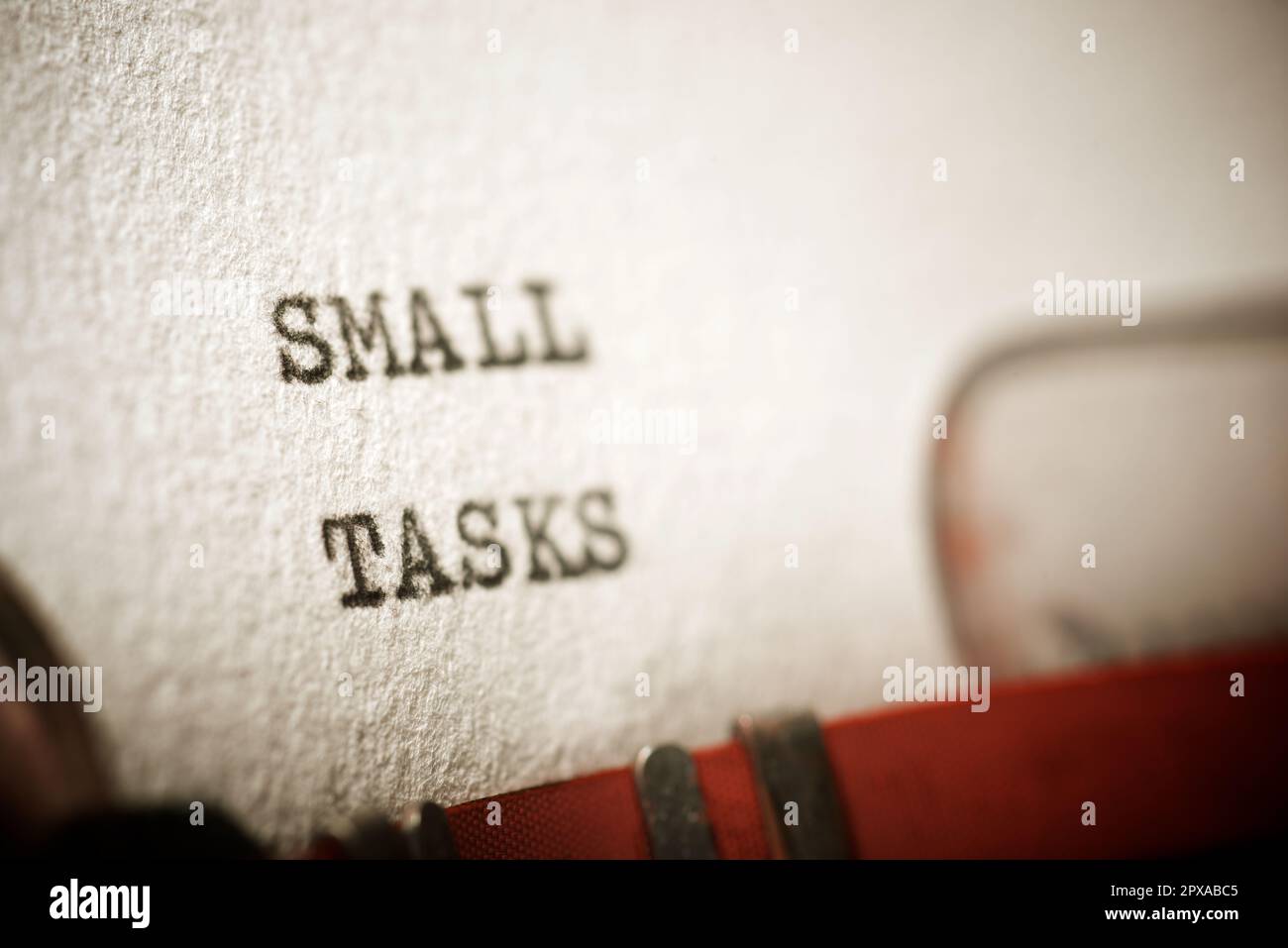 Small tasks text written with a typewriter Stock Photo - Alamy