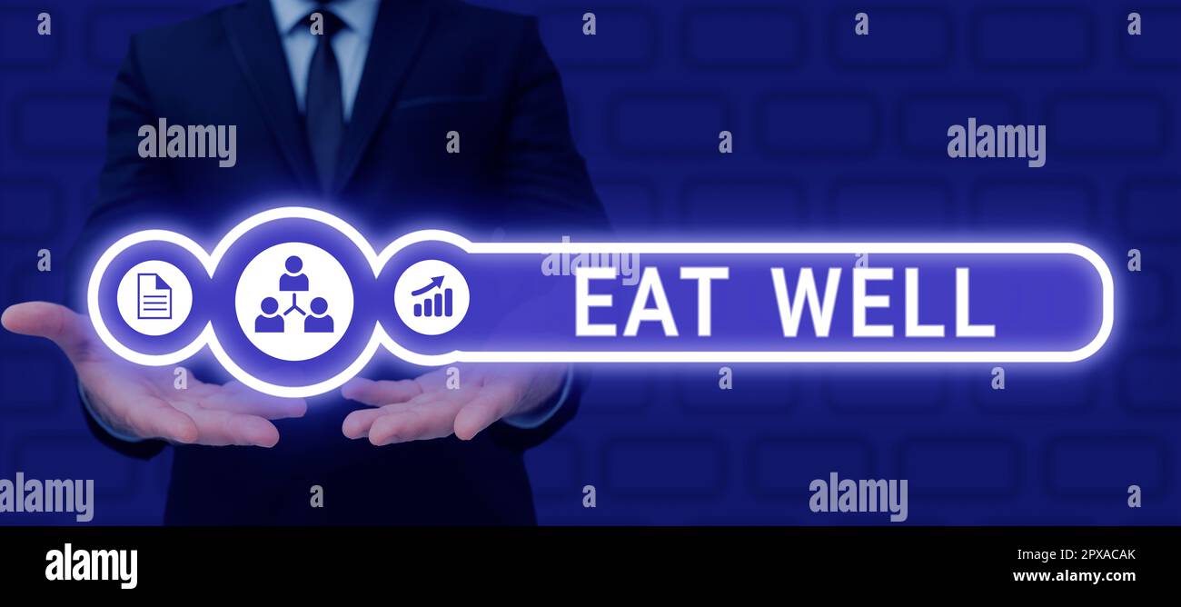 Hand writing sign Eat Well, Conceptual photo Practice of eating only ...