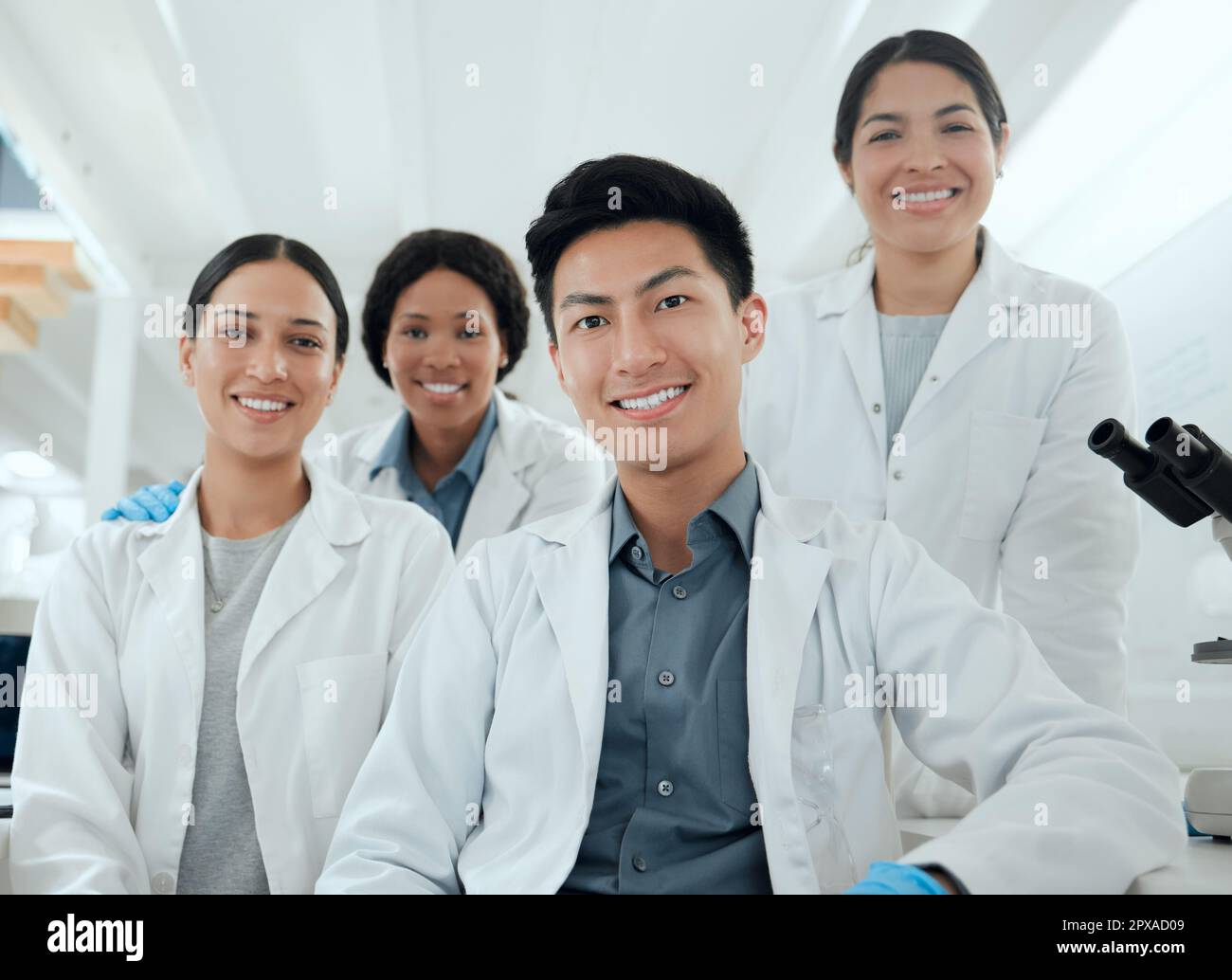 Confident team of scientists in the lab hi-res stock photography and ...