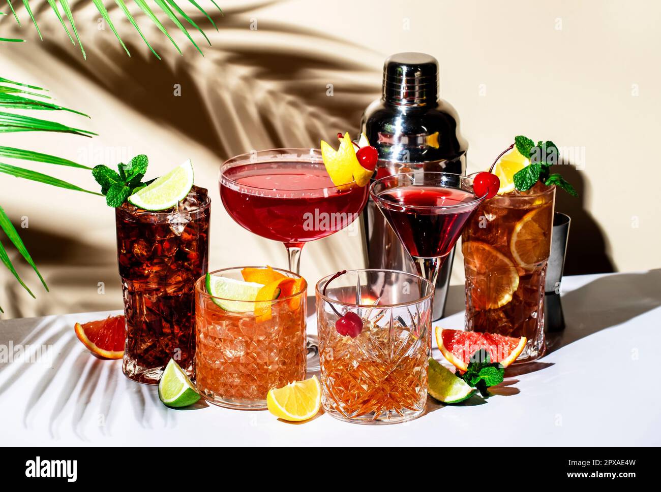 Summer alcoholic cocktails: rum cola, long island ice tea, manhattan ...