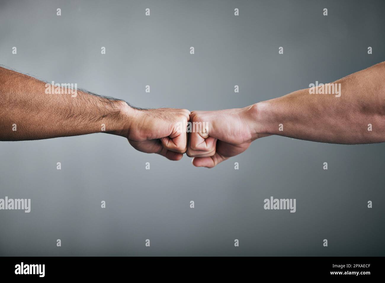Go out and get it. two unrecognizable male athletes fist bumping ...
