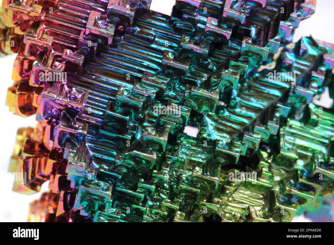 Bismuth - rainbow metal texture as color background Stock Photo - Alamy