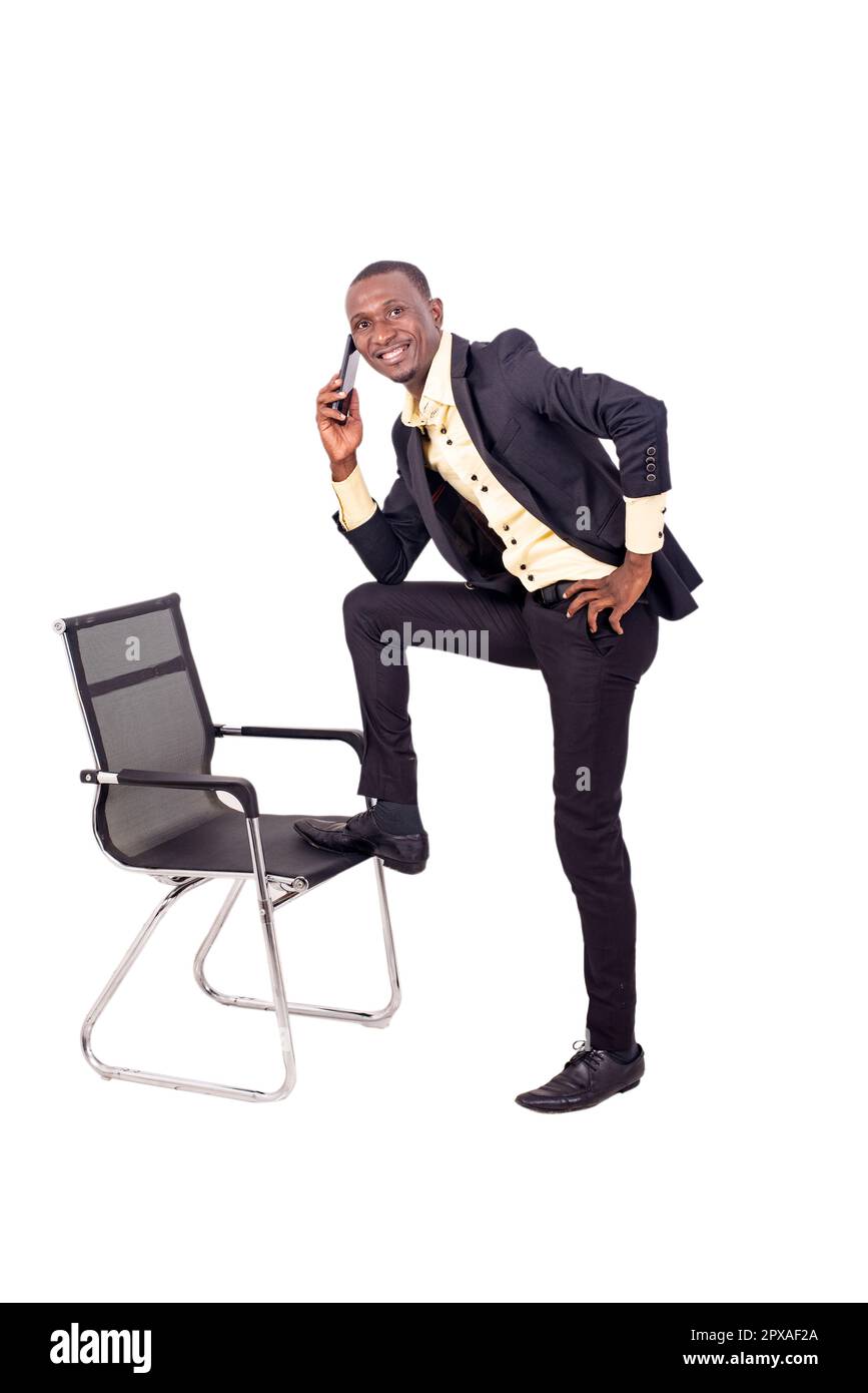 Man standing feet on chair hi-res stock photography and images - Alamy