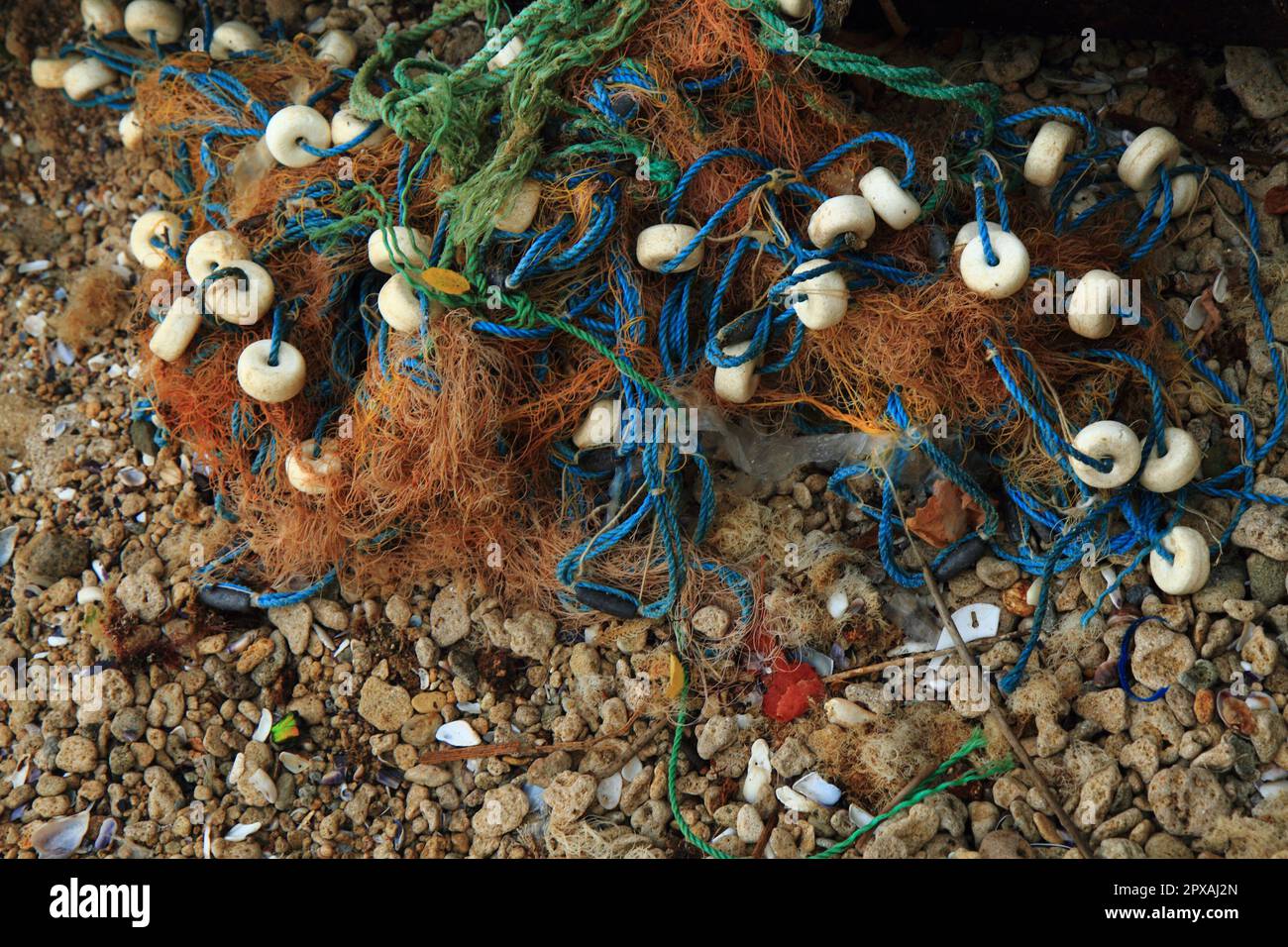 Damaged fishing nets hi-res stock photography and images - Alamy