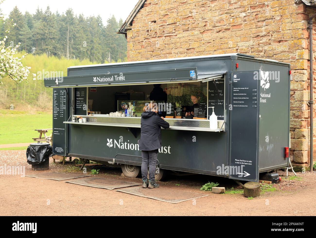 Customer buying refreshments at the National trust van at Comer woods ...