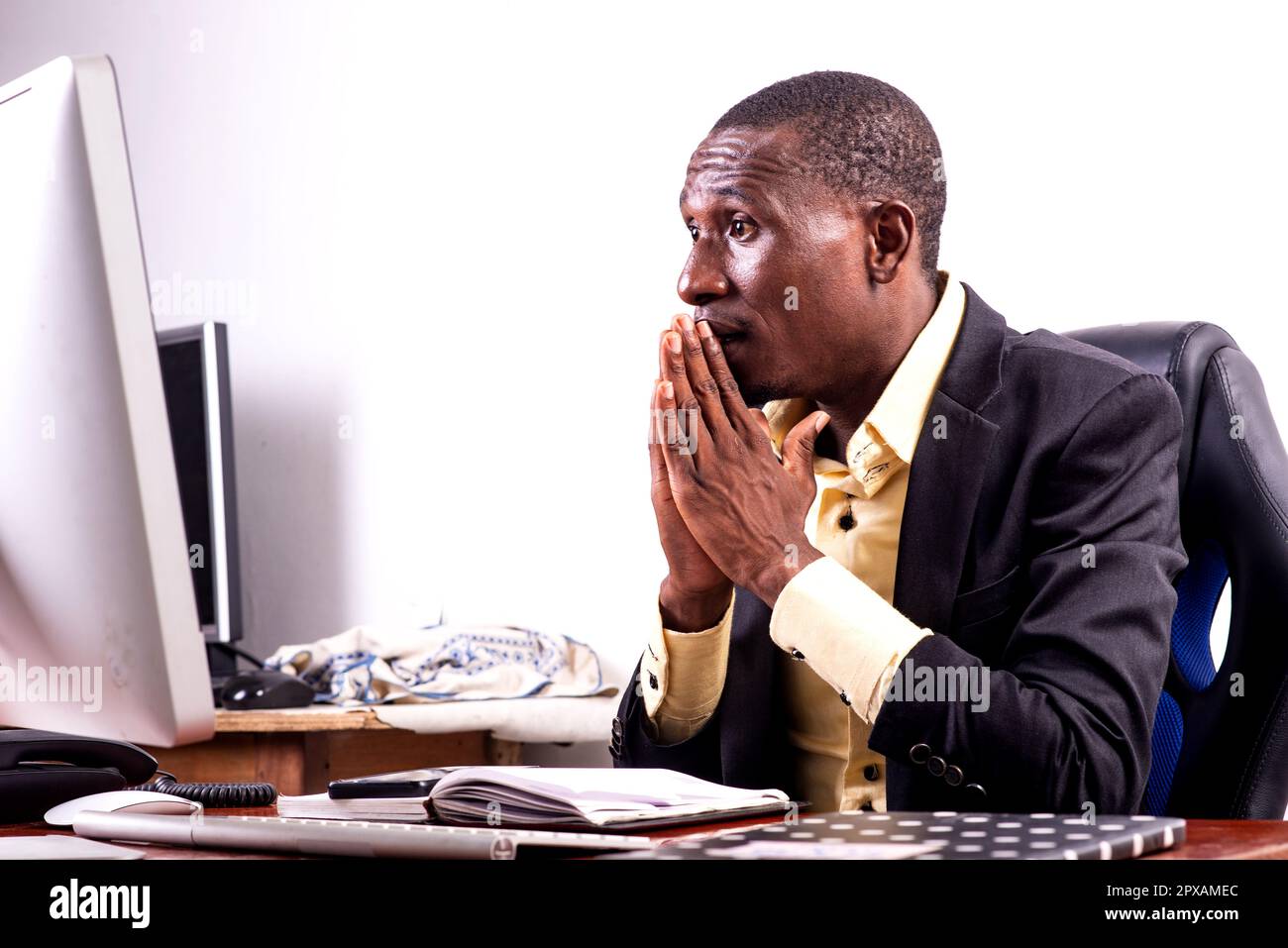 Businessman hands together in prayer hi-res stock photography and ...