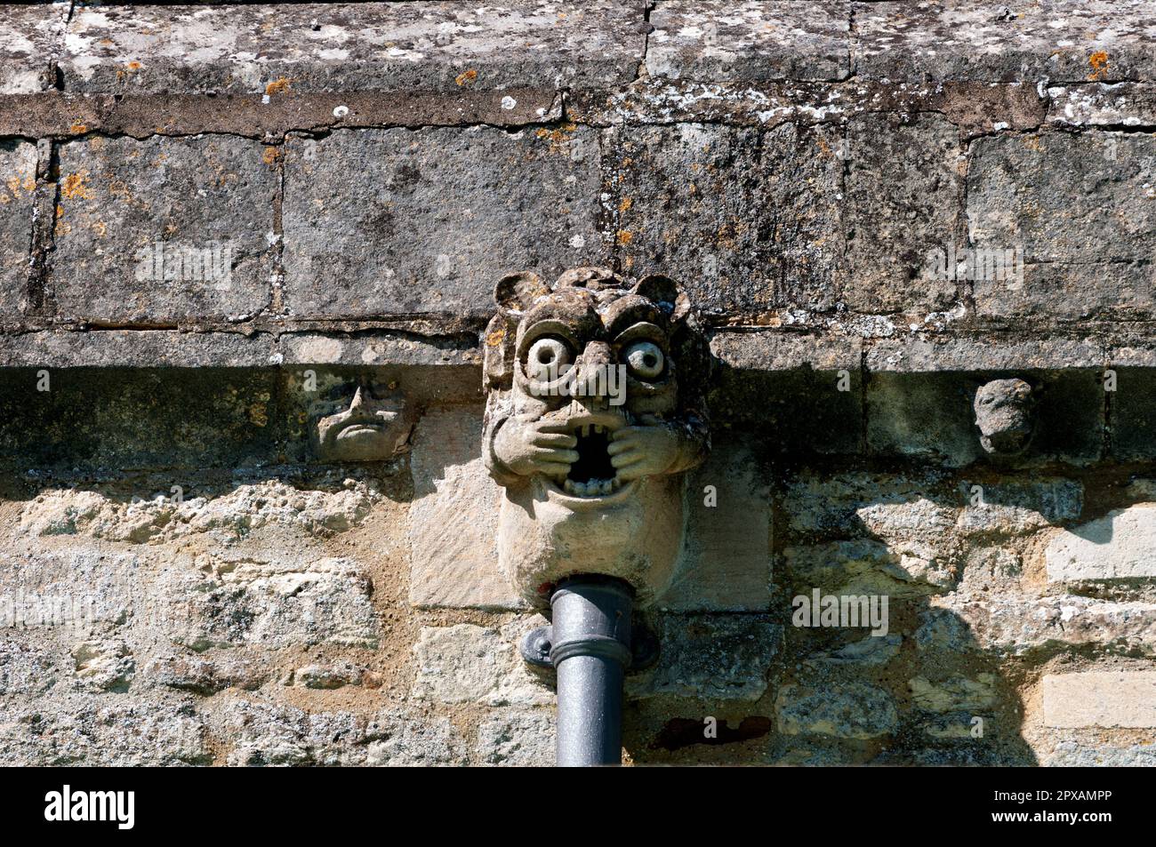 A gargoyle on Holy Trinity Church, Denford, Northamptonshire, England ...