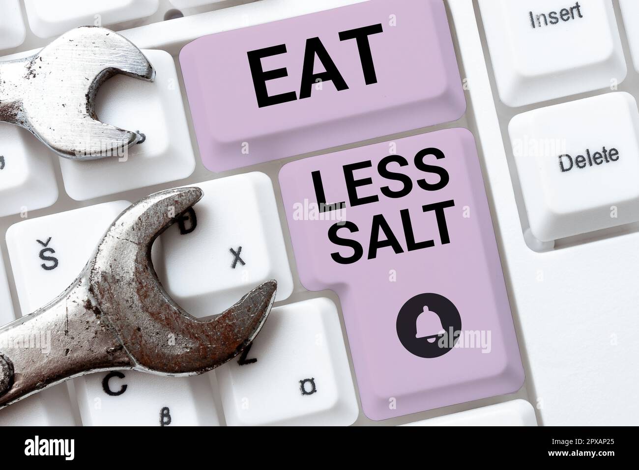 Hand writing sign Eat Less Salt, Internet Concept reducing the sodium ...