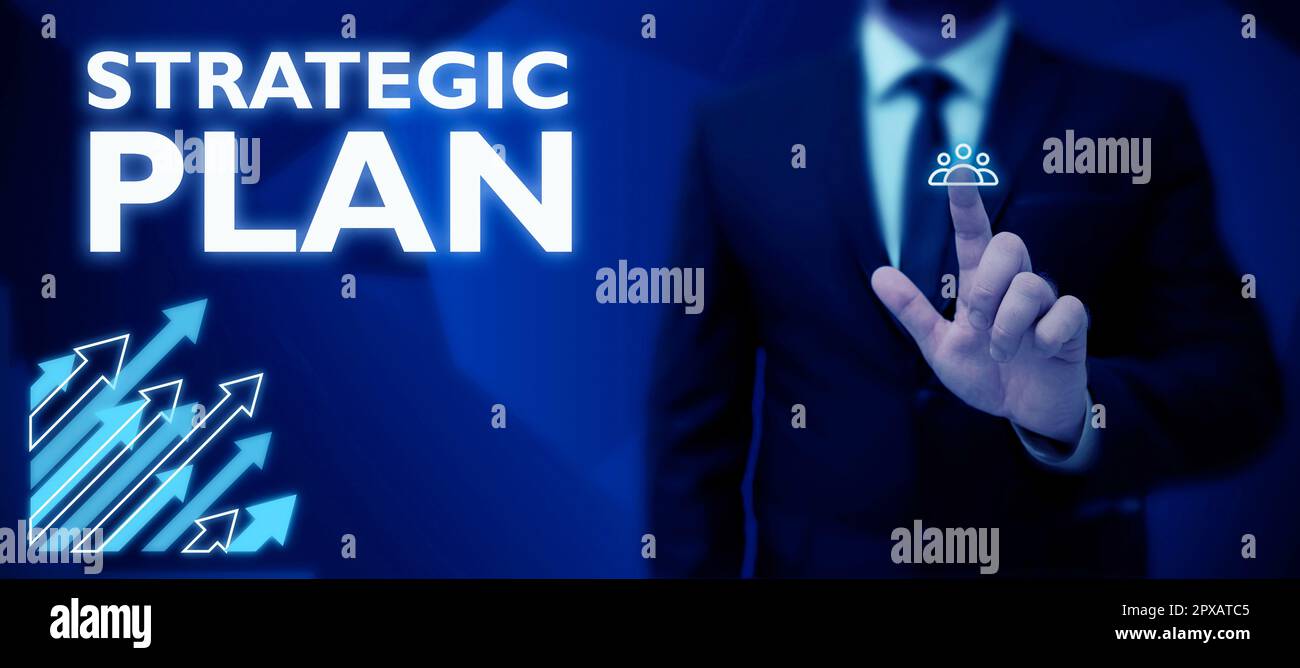 Hand writing sign Strategic Plan, Word Written on A process of defining ...