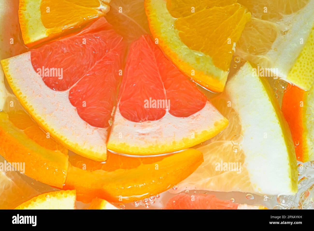 Close-up view of the grapefruit, orange fruit and honey pomelo slices ...