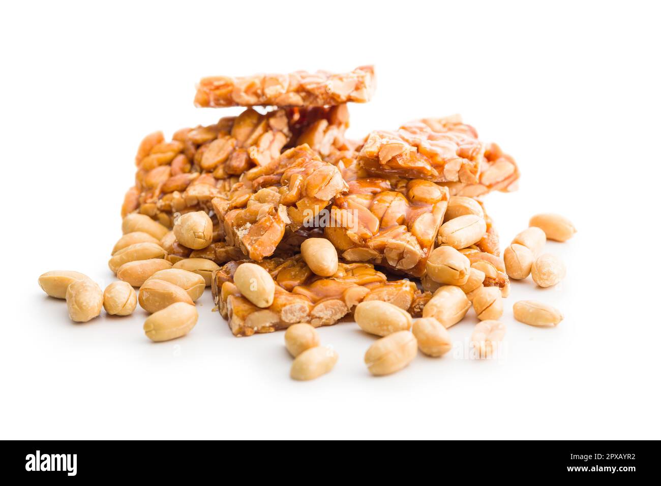 Sweet peanut brittle. Tasty peanuts in caramel isolated on the white ...