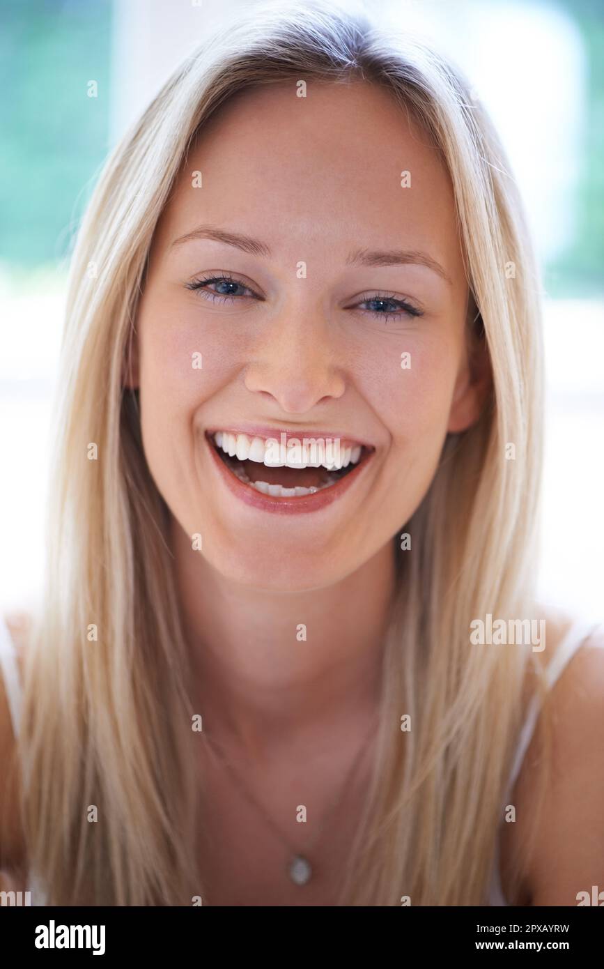 Thats hilarious. Cute young woman looking at you and laughing happily ...