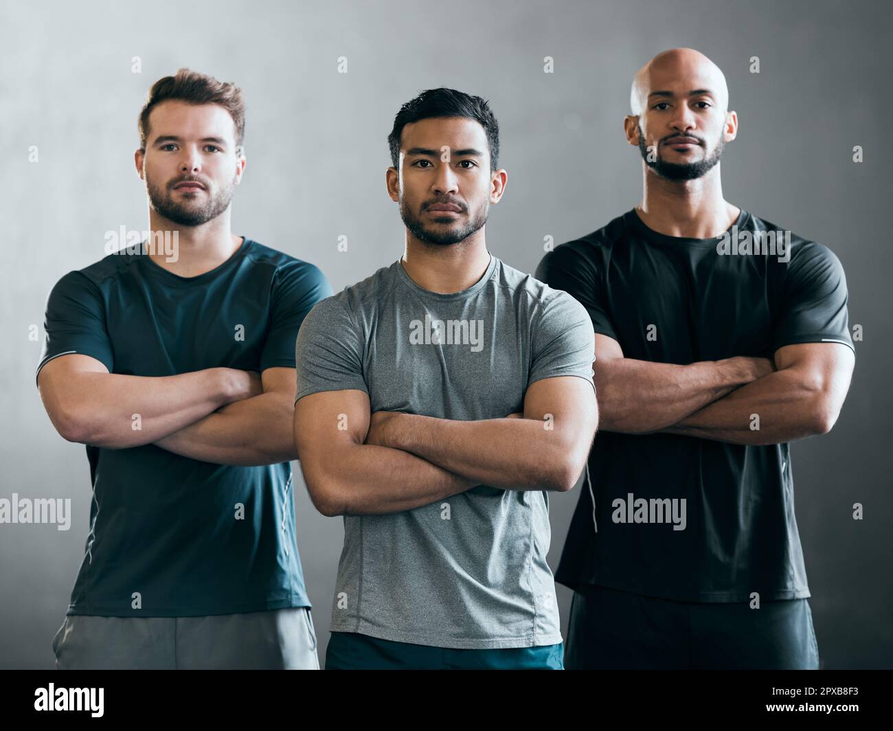 Theyre a confident bunch. Cropped portrait of three handsome young male ...
