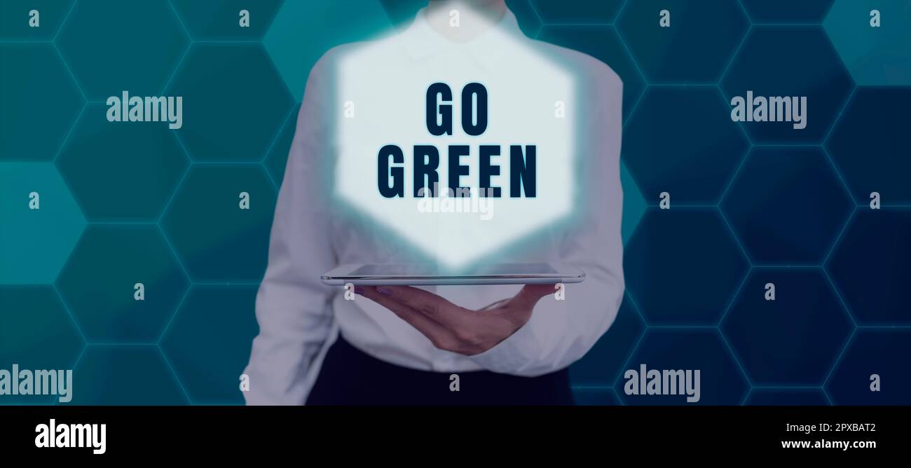 Hand writing sign Go Green, Internet Concept making more ...