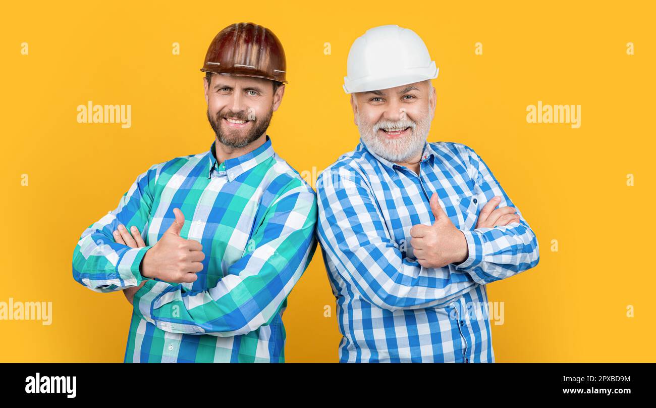 workman generation men on background, thumb up. photo of workman ...