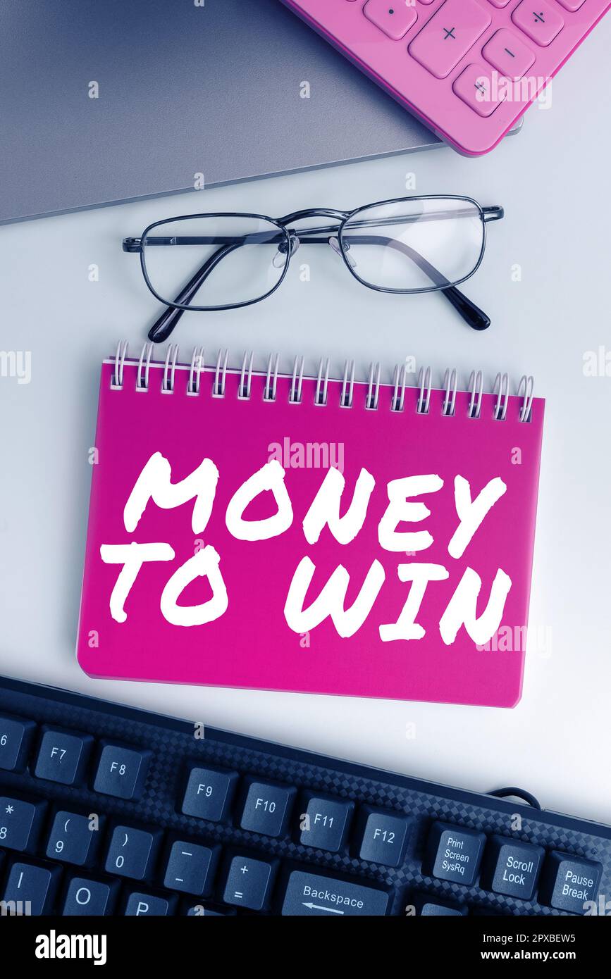 Hand writing sign Money To Win, Internet Concept Calculating revenues ...