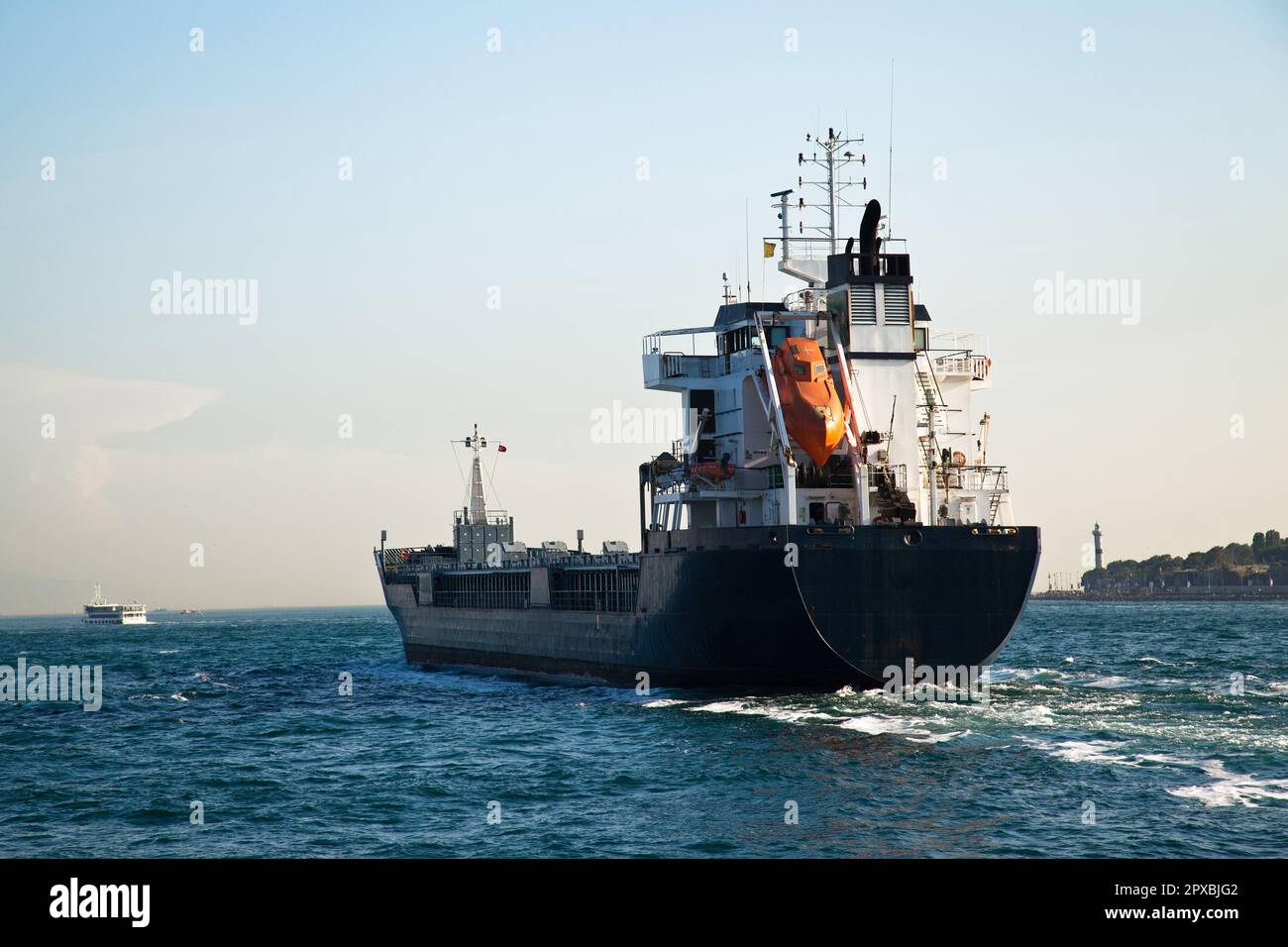 Large cargo ship, cargo ship carrying containers, engaged in ...