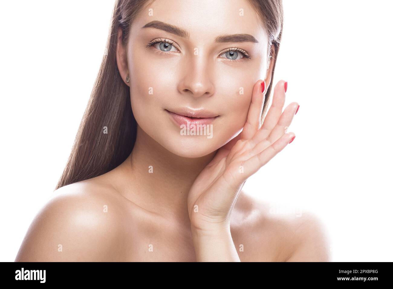 Beautiful young girl with a light natural make-up and perfect skin ...