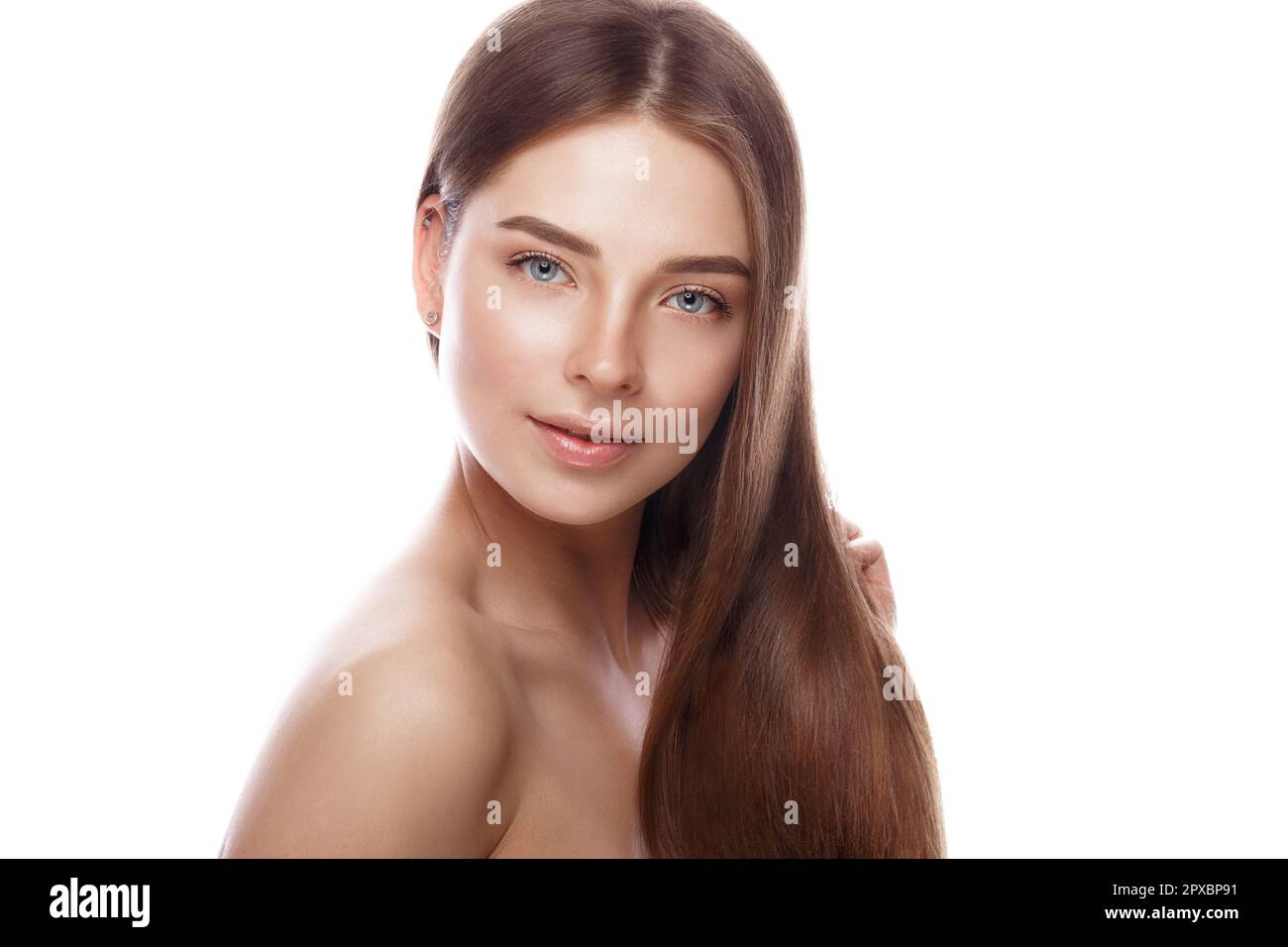 Beautiful young girl with a light natural make-up and perfect skin ...