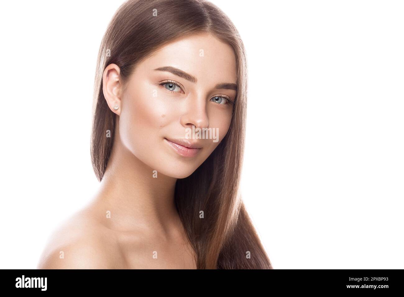 Beautiful young girl with a light natural make-up and perfect skin ...