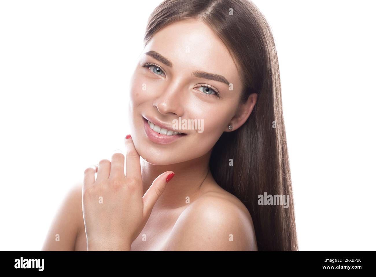 Beautiful young girl with a light natural make-up and perfect skin ...