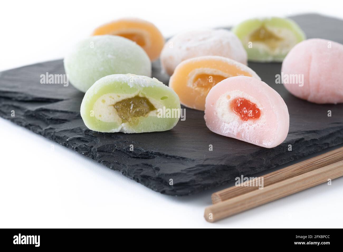 Japanese colorful mochi isolated on white background Stock Photo - Alamy
